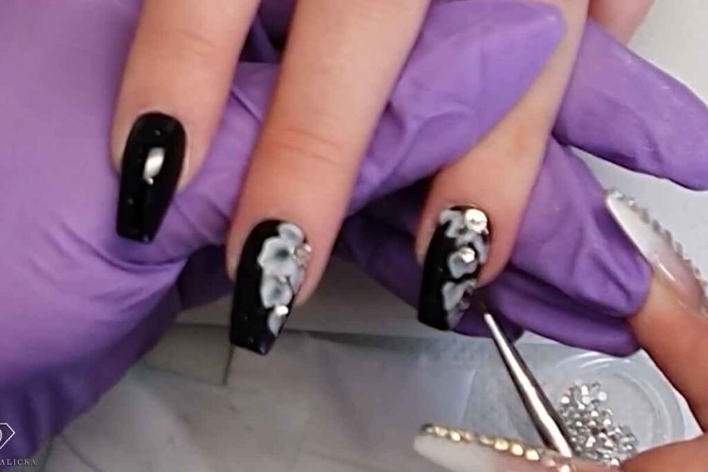 Modern Black Spring Nail Art: Sculpted Gel with Floral Accents