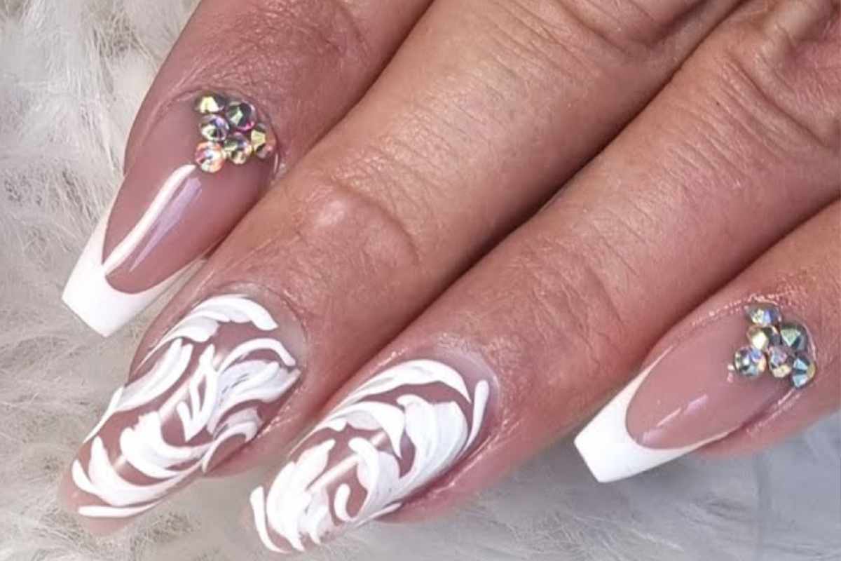 Creating Elegant Filigree Nail Art with Gel and Gem Embellishments