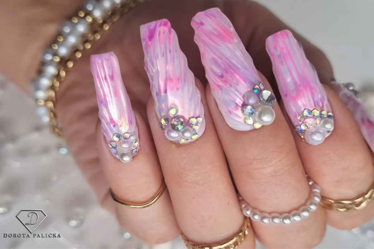 Stunning 3D Shell Nail Design for a Unique Summer Look